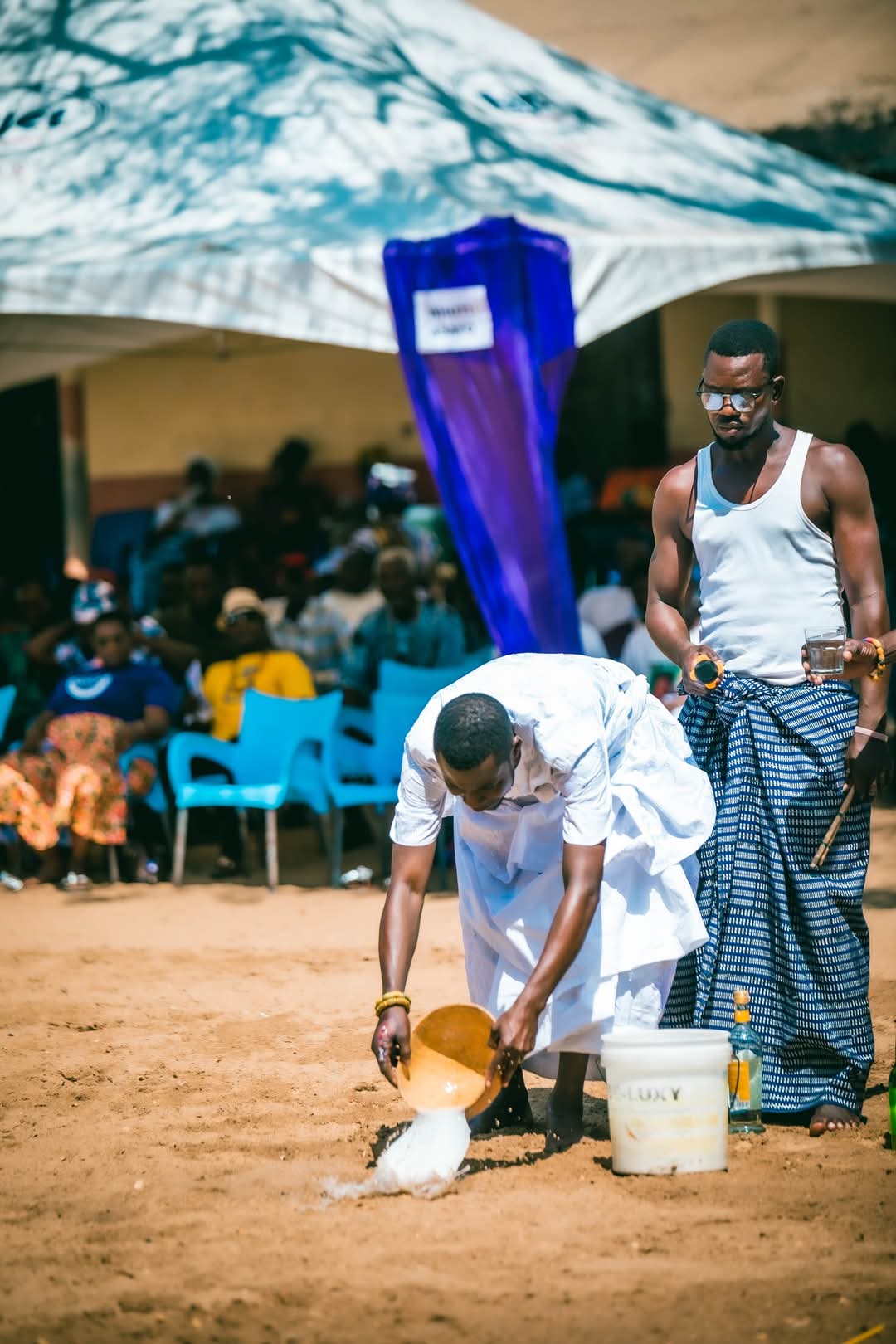 Pouring of libation,an Ewe culture.